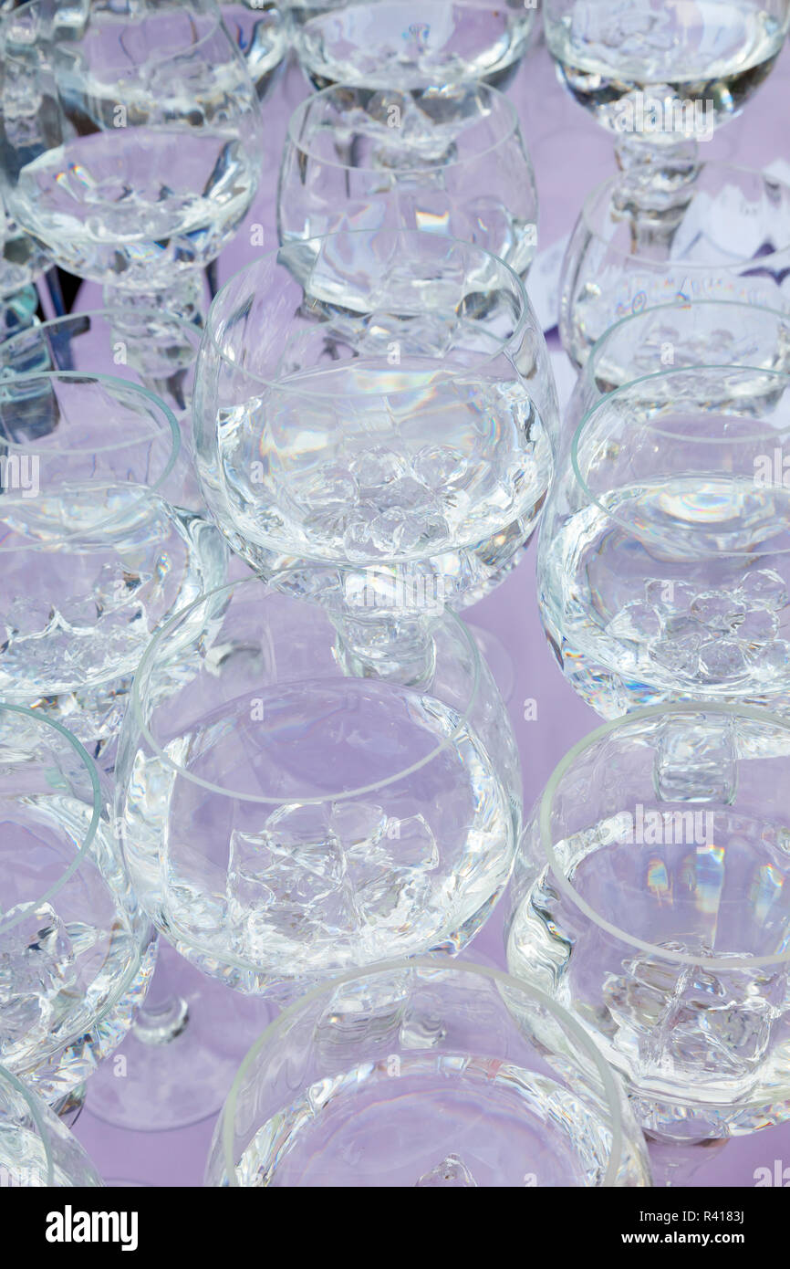 Many wine glasses stacked up and ready for use at a wedding Stock Photo ...