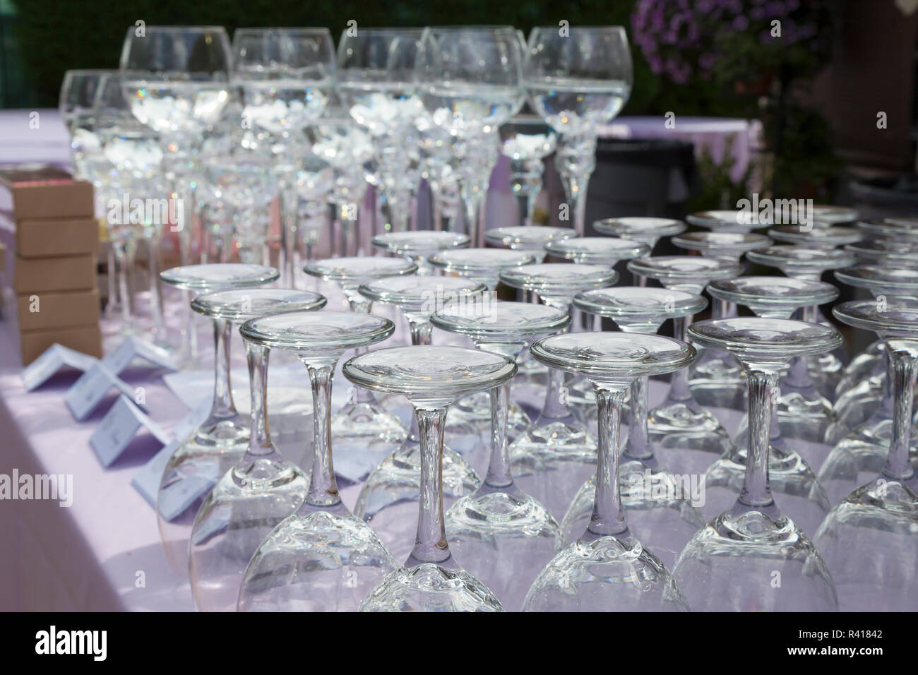 Many wine glasses stacked up and ready for use at a wedding Stock Photo ...