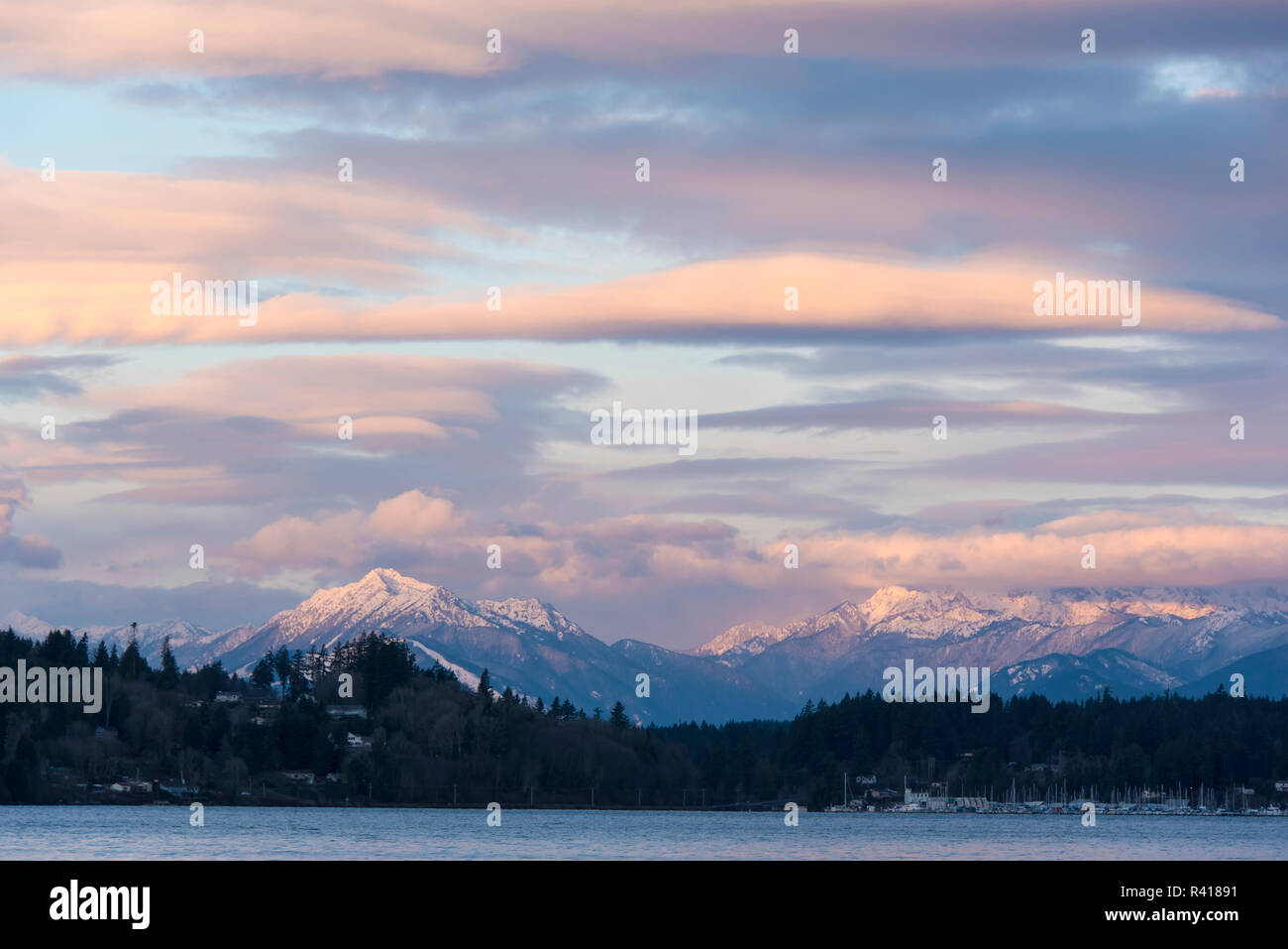 USA, Washington State. Puget Sound. Dramatic clouds sunrise colors ...