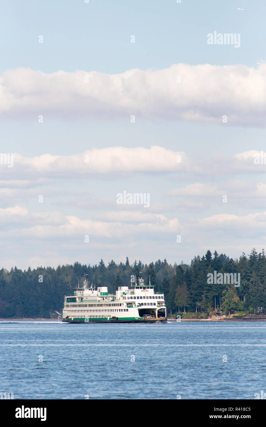 USA, Washington State, Seattle-Bremerton ferry makes way blue skies and ...