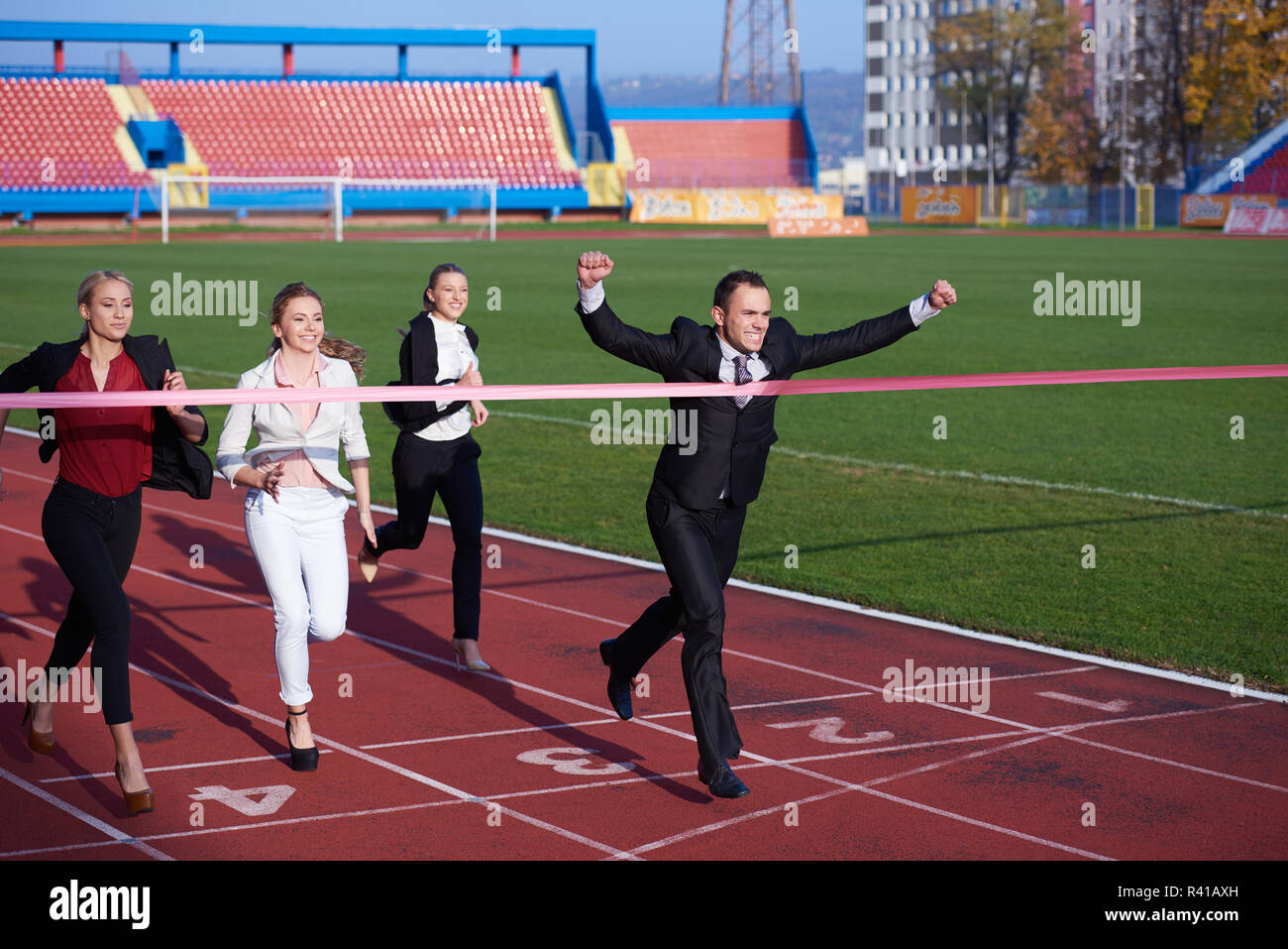 business people running on racing track Stock Photo - Alamy