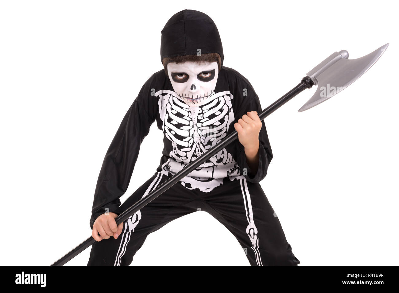 Boy in Halloween skeleton costume Stock Photo - Alamy