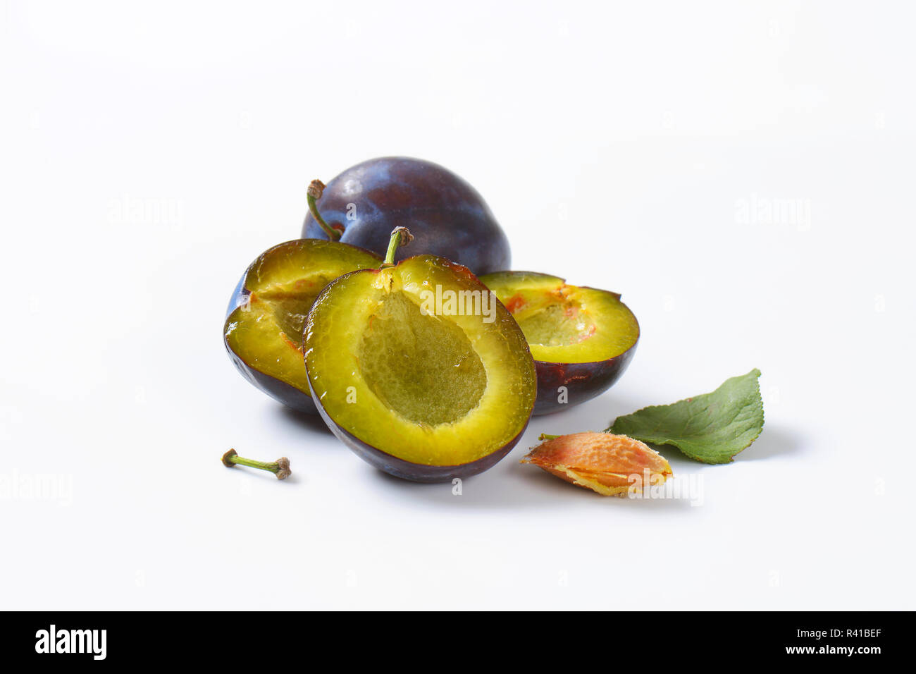 Plums prunus insititia Cut Out Stock Images & Pictures - Alamy