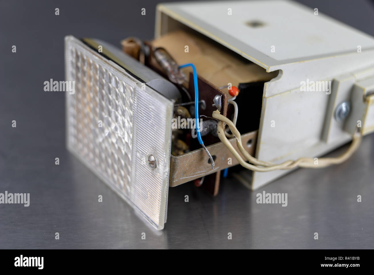 Old flash lamps on a metal table. Photo accessories from central europe ...