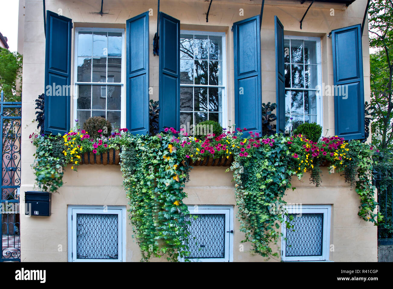 USA, North Carolina, Charleston. Windows with flower boxes Stock Photo ...