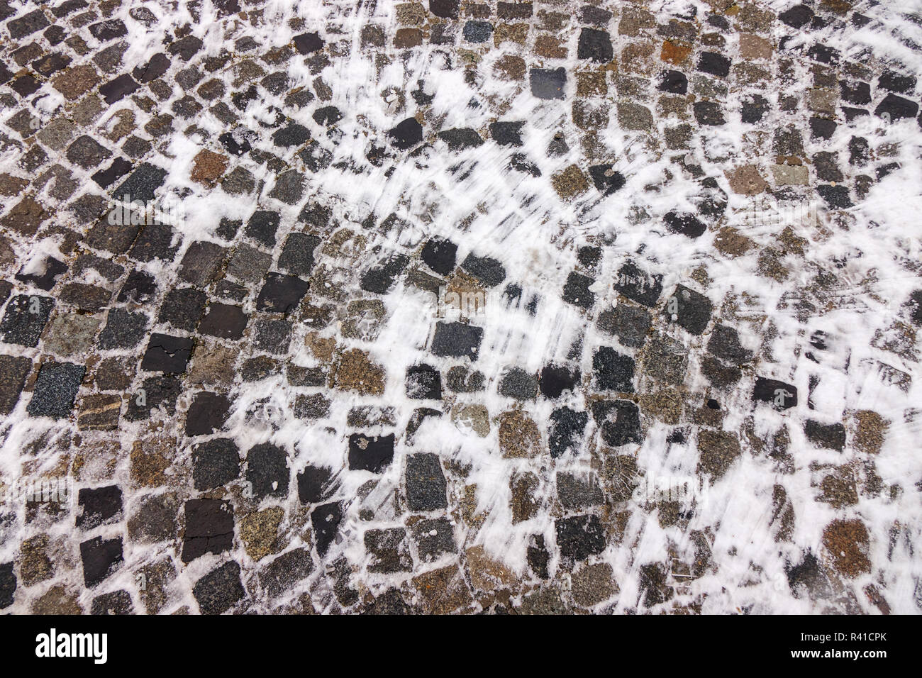 Cobble under the snow Stock Photo - Alamy