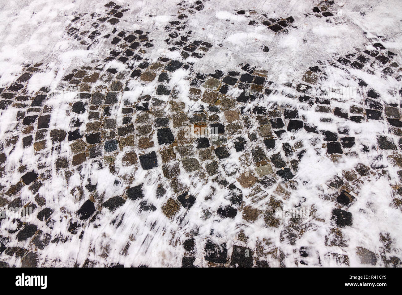 Cobble under the snow Stock Photo - Alamy
