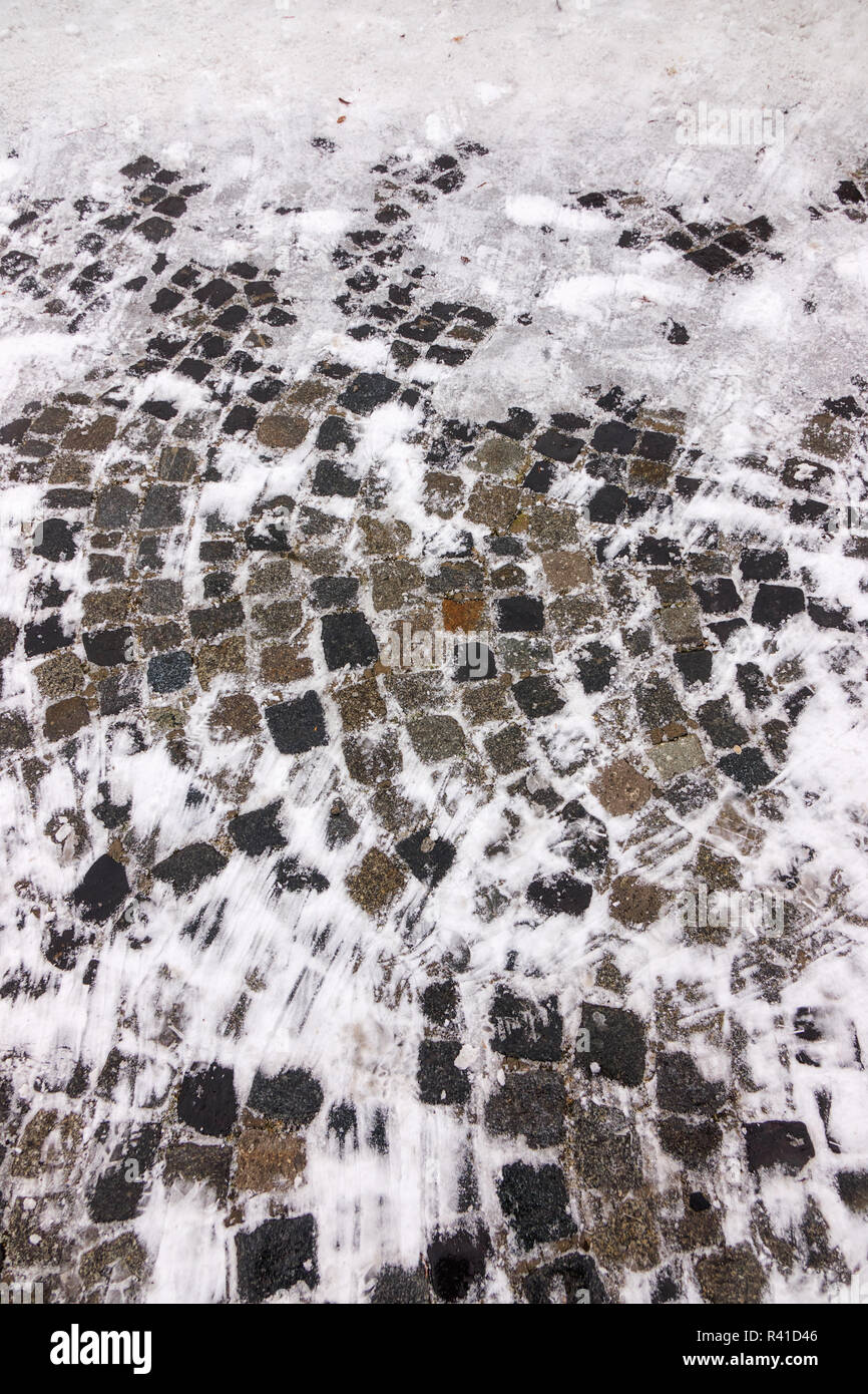 Cobble under the snow Stock Photo - Alamy