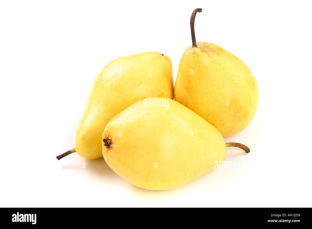 Three ripe yellow pear fruits isolated on white background Stock Photo ...
