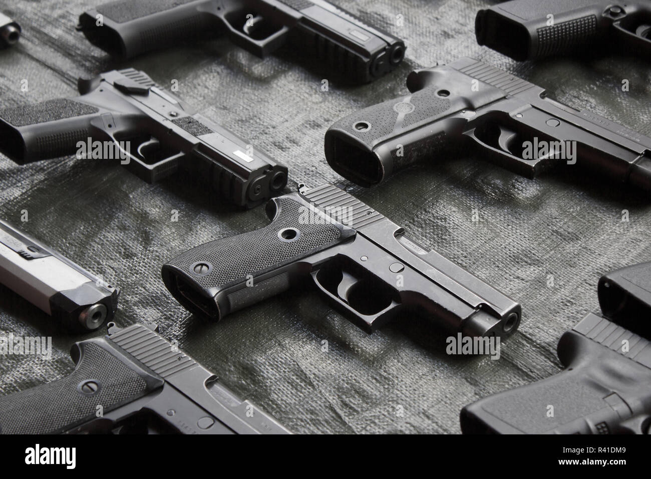 Small handguns hi-res stock photography and images - Alamy