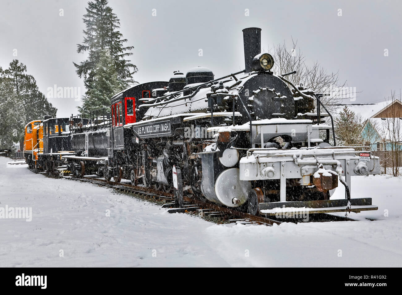 Steam engine train on tracks in town of Snoqualmie, Washington State ...