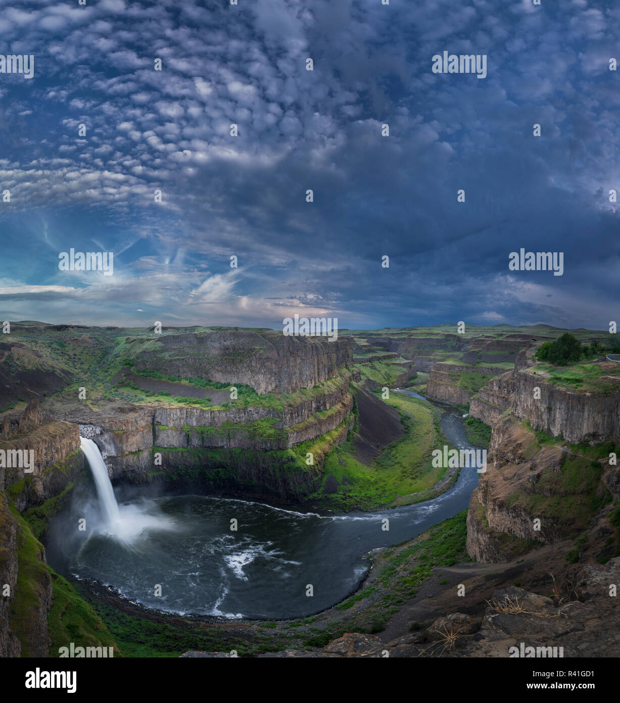 USA, Washington State. Palouse Falls in the spring, with an approaching ...