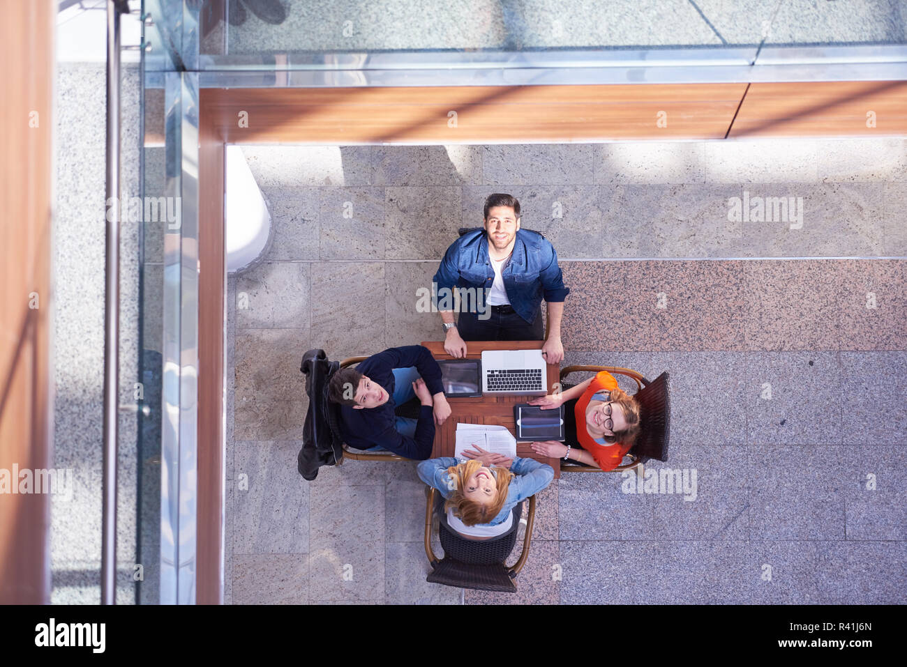 students group working on school project together Stock Photo - Alamy