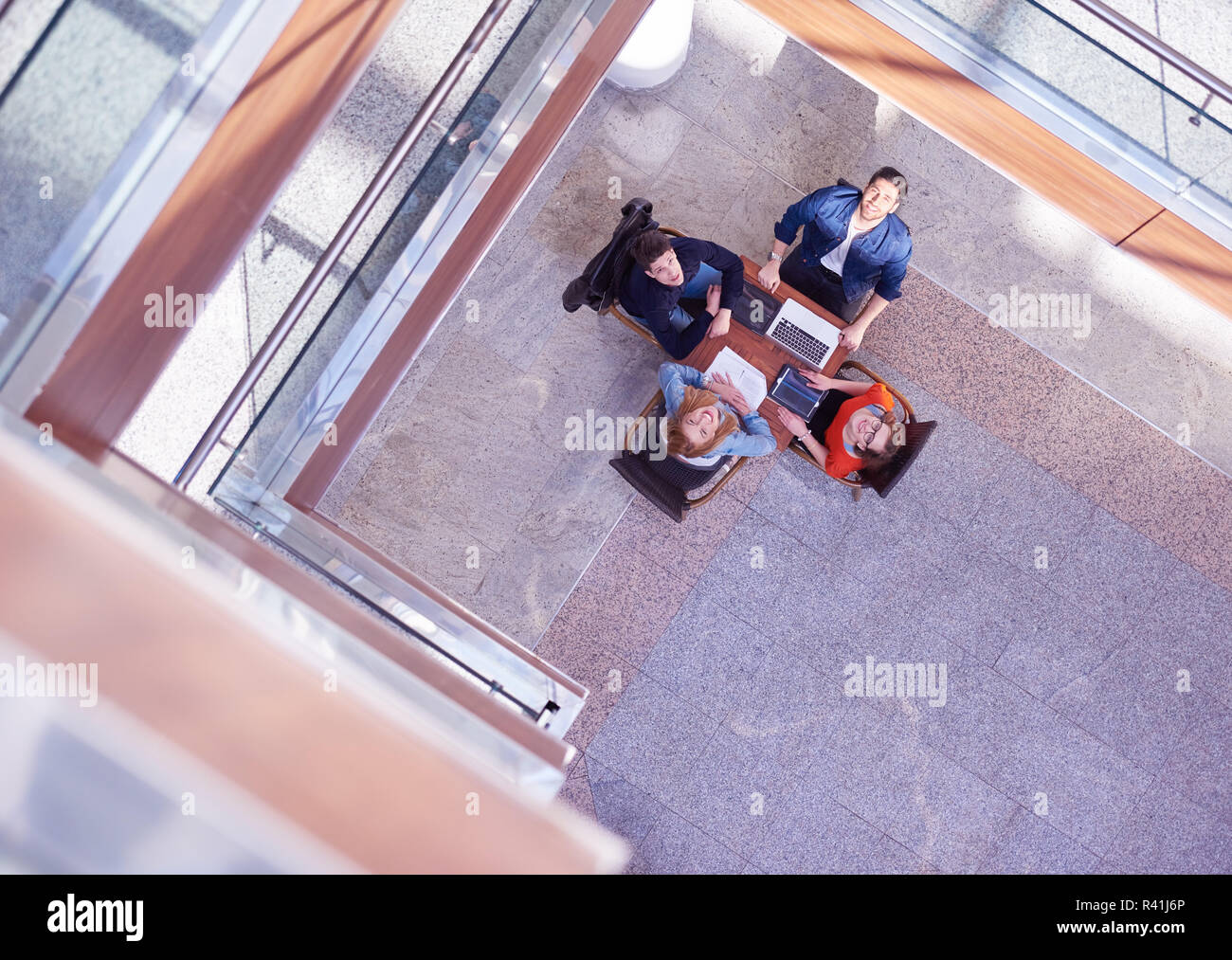 students group working on school project together Stock Photo - Alamy