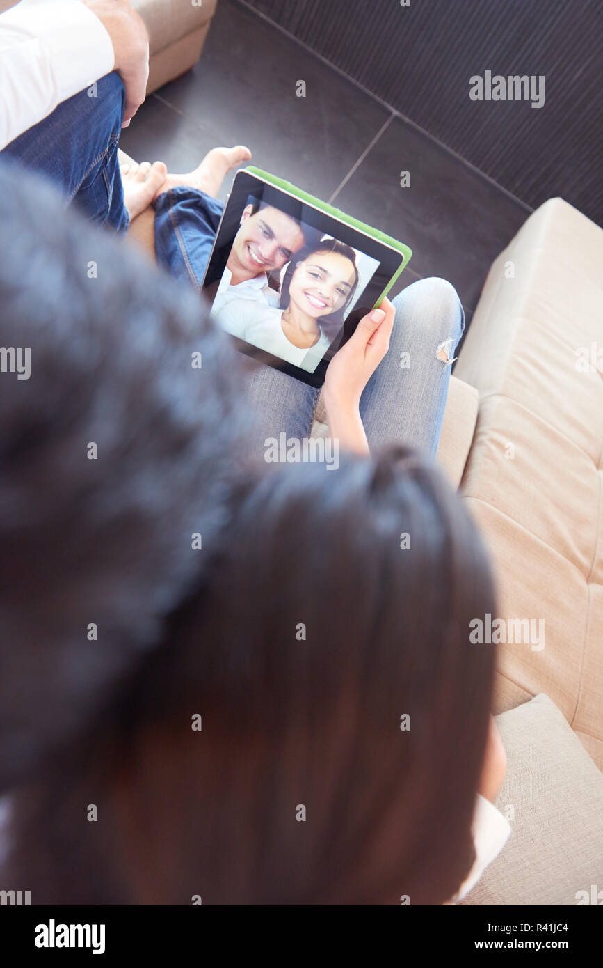 couple at modern home using tablet computer Stock Photo - Alamy
