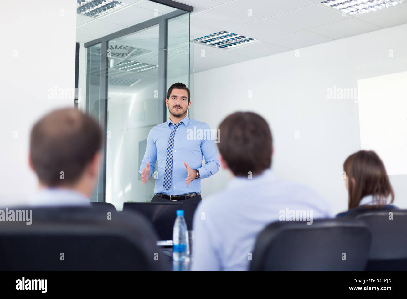 Business man making presentation in office on job interview Stock Photo ...
