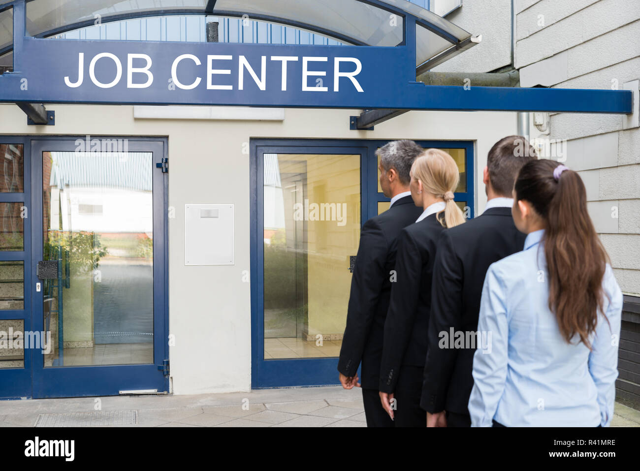 Job centre queue hi-res stock photography and images - Alamy