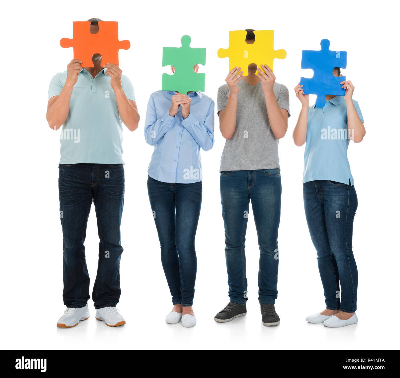 People Covering Face With Puzzle Pieces Stock Photo - Alamy