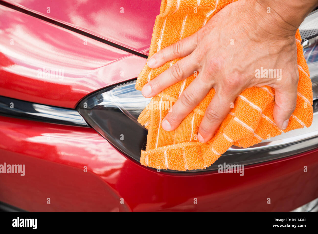 Persons hand cleaning car hi-res stock photography and images - Alamy