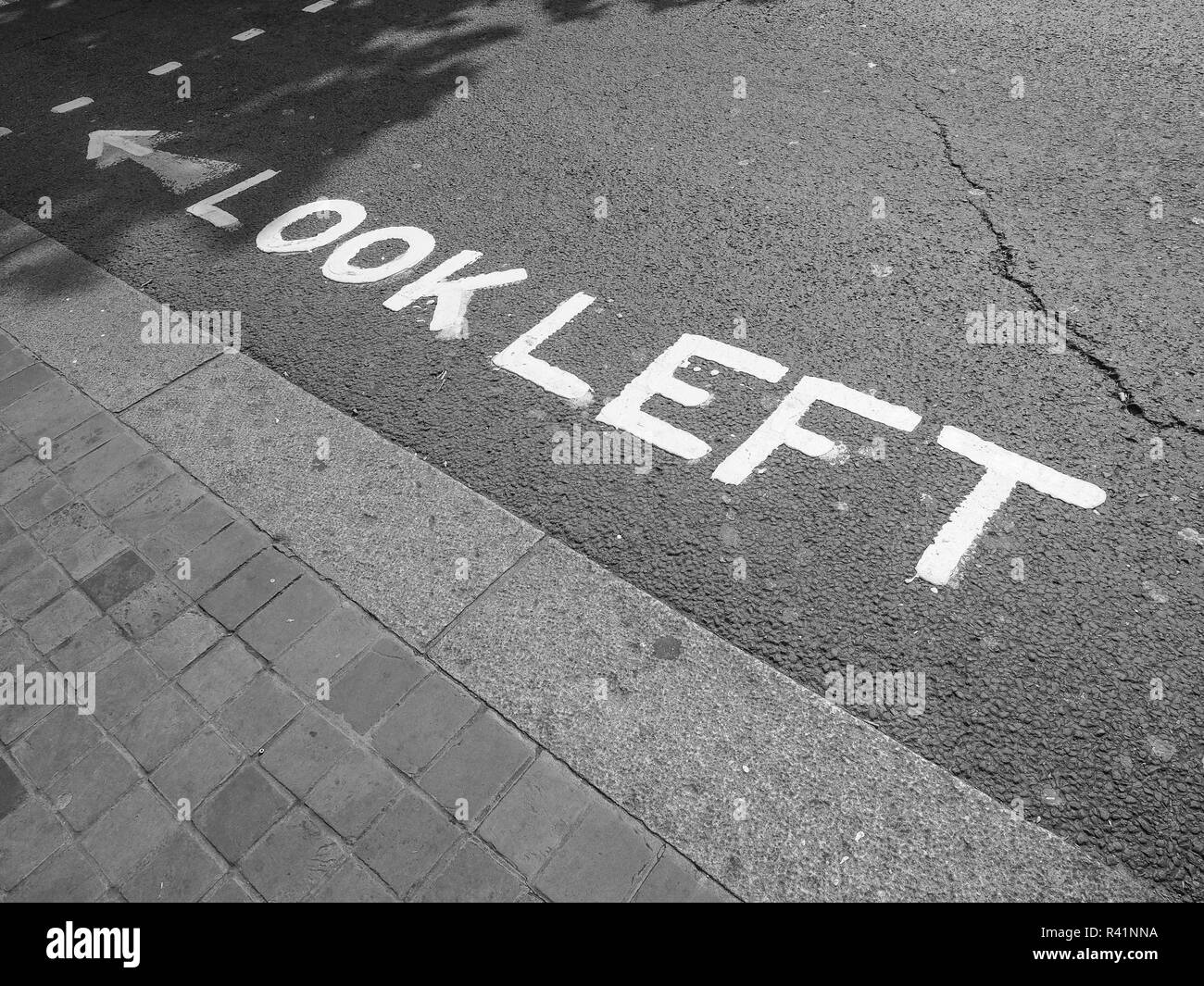 Black and white Look Left sign Stock Photo - Alamy