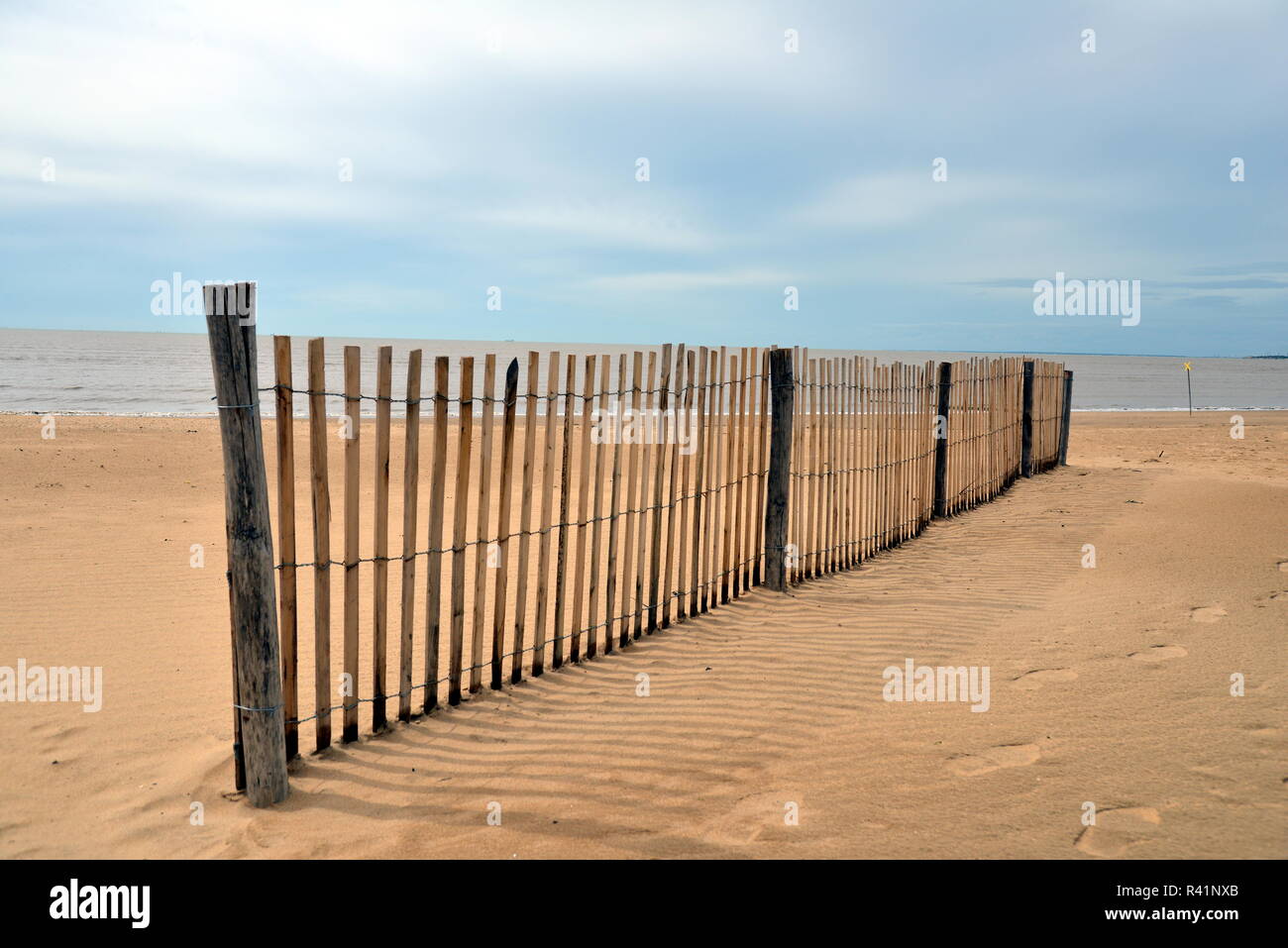 fences on the sandy beach Stock Photo - Alamy