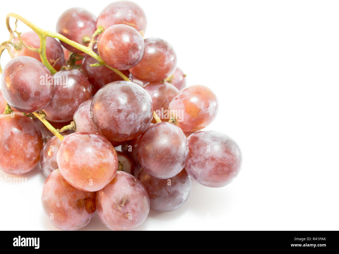 Chinese red grape on white background Stock Photo - Alamy