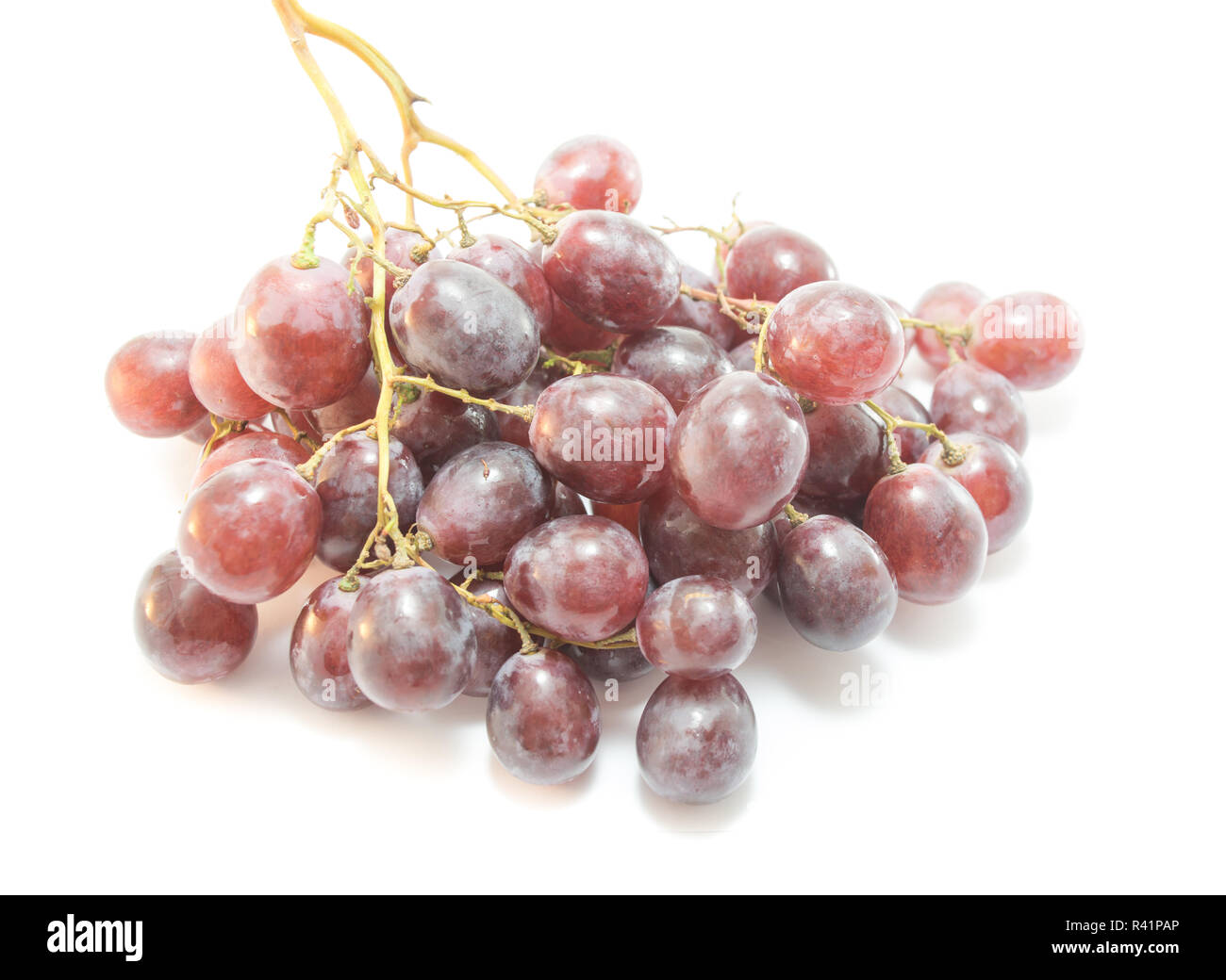 Chinese red grape on white background Stock Photo - Alamy