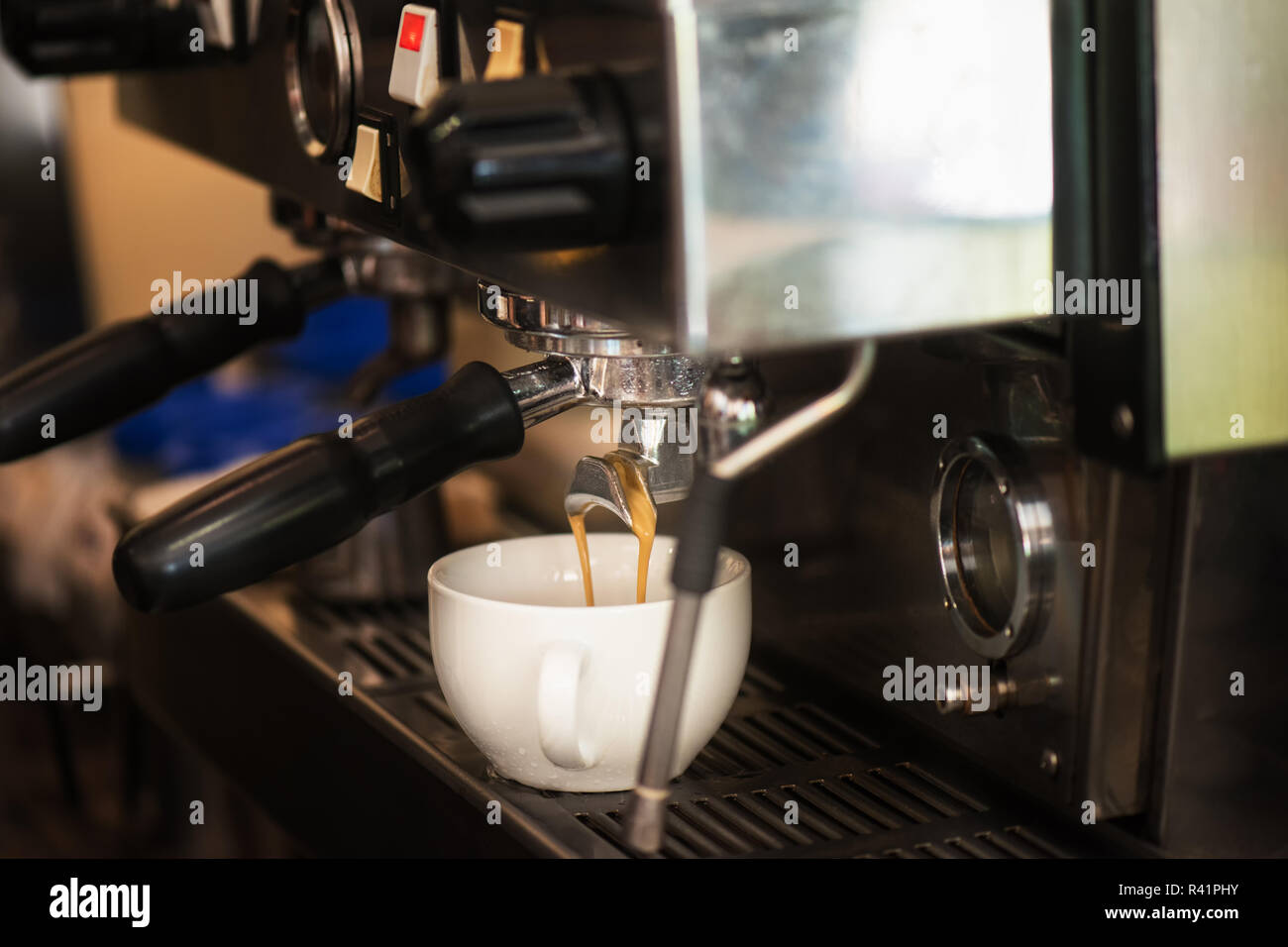 preparing coffee in cafe Stock Photo - Alamy