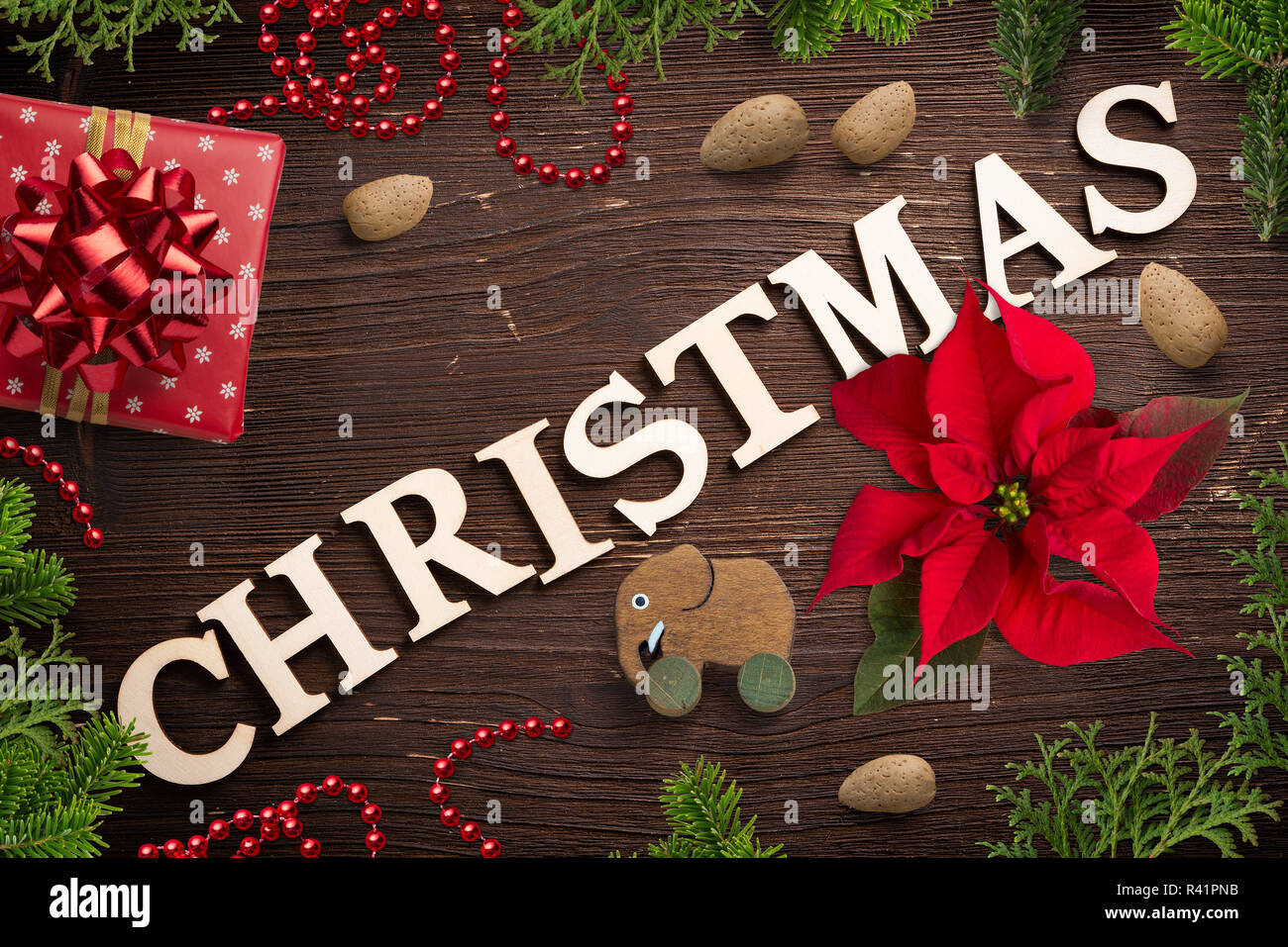 christmas decoration and the word "christmas" on rustic wooden ...