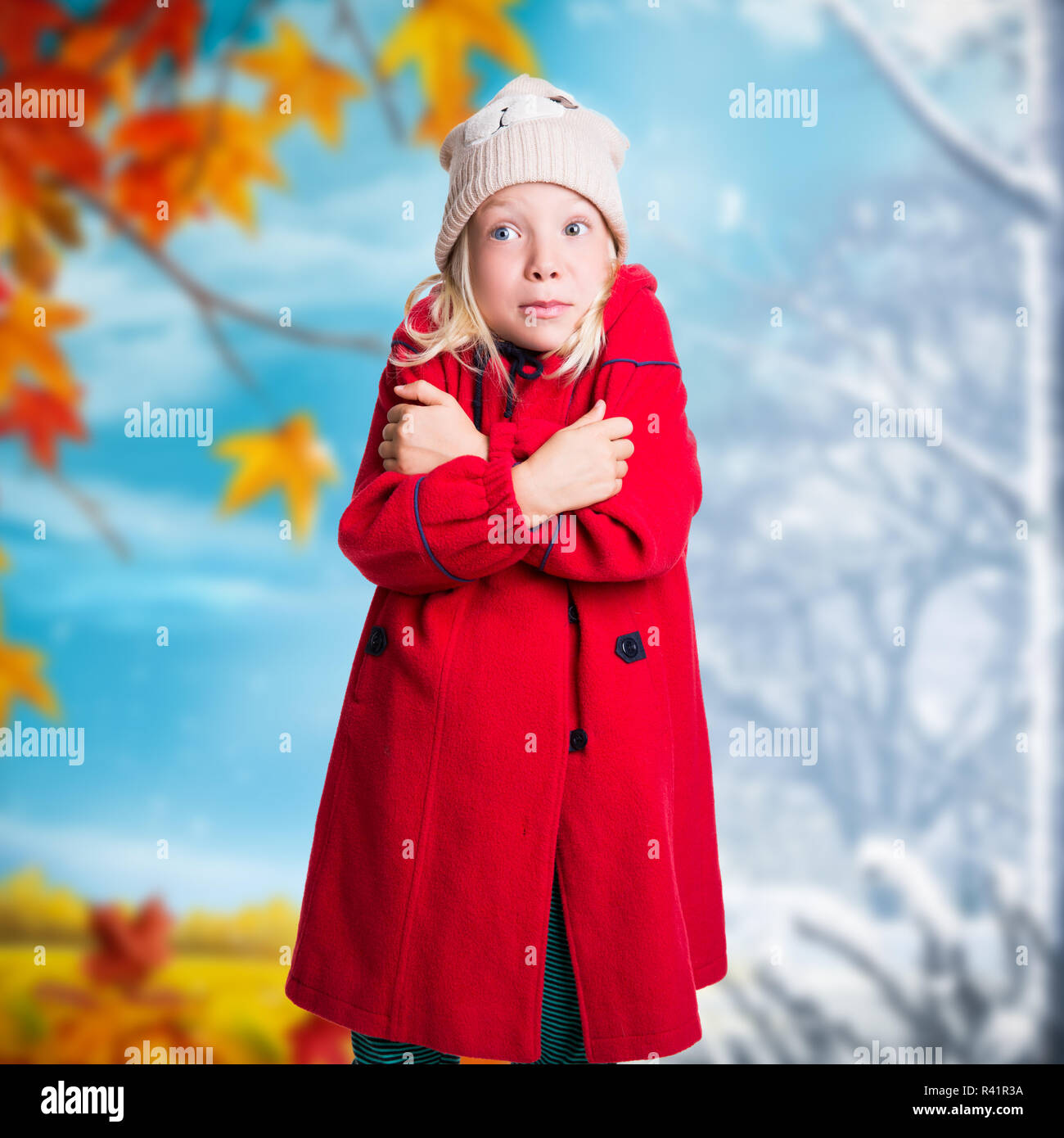 young girl in winter clothes in front of changing season background ...