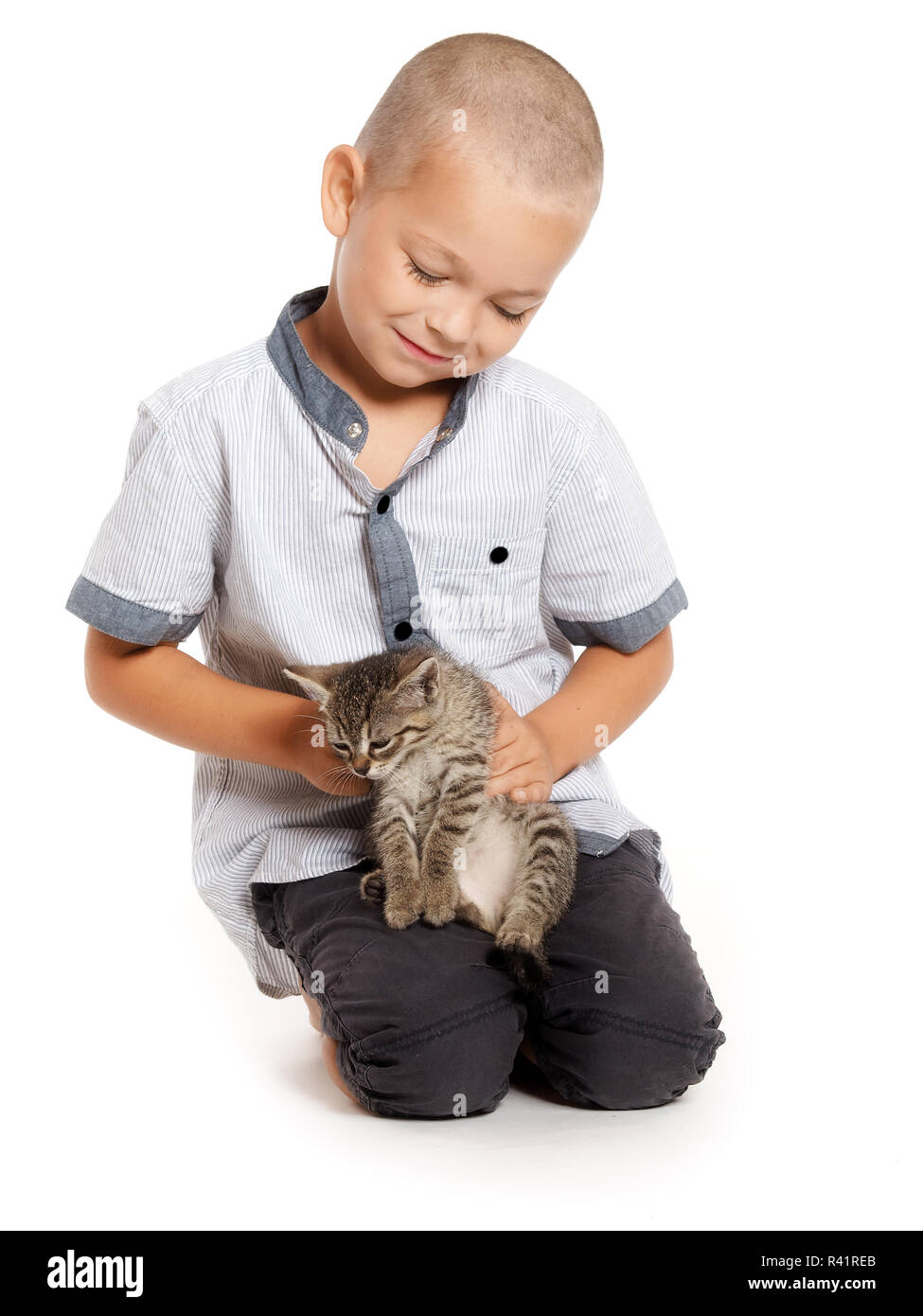 Boy with kitten Stock Photo - Alamy
