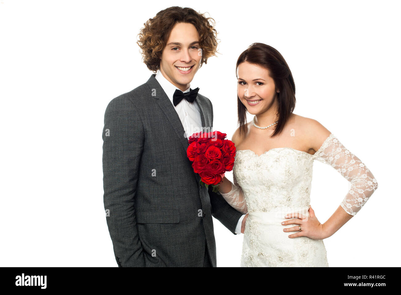 Adorable wedding couple posing Stock Photo - Alamy