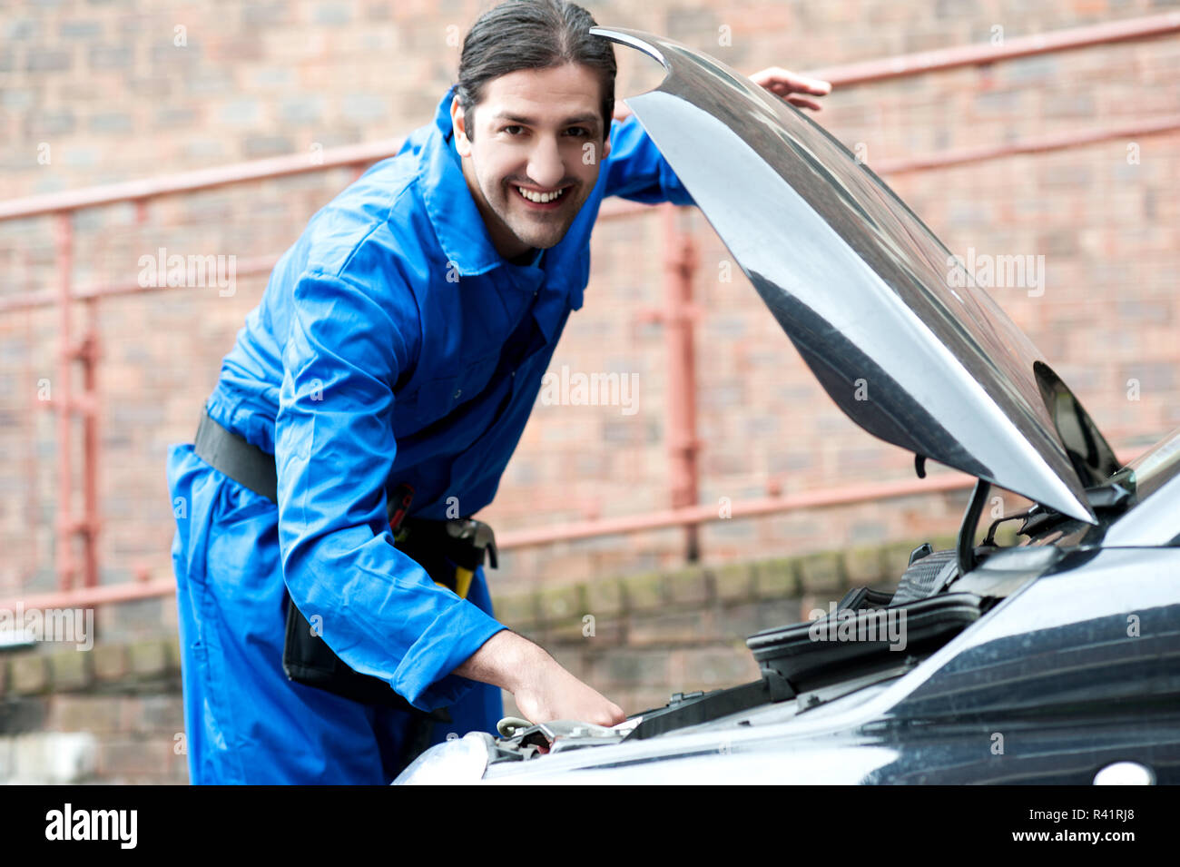 Male mechanic at work Stock Photo - Alamy