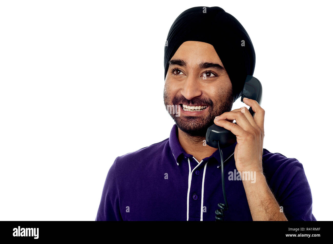 Smiling Indian man on the phone Stock Photo - Alamy