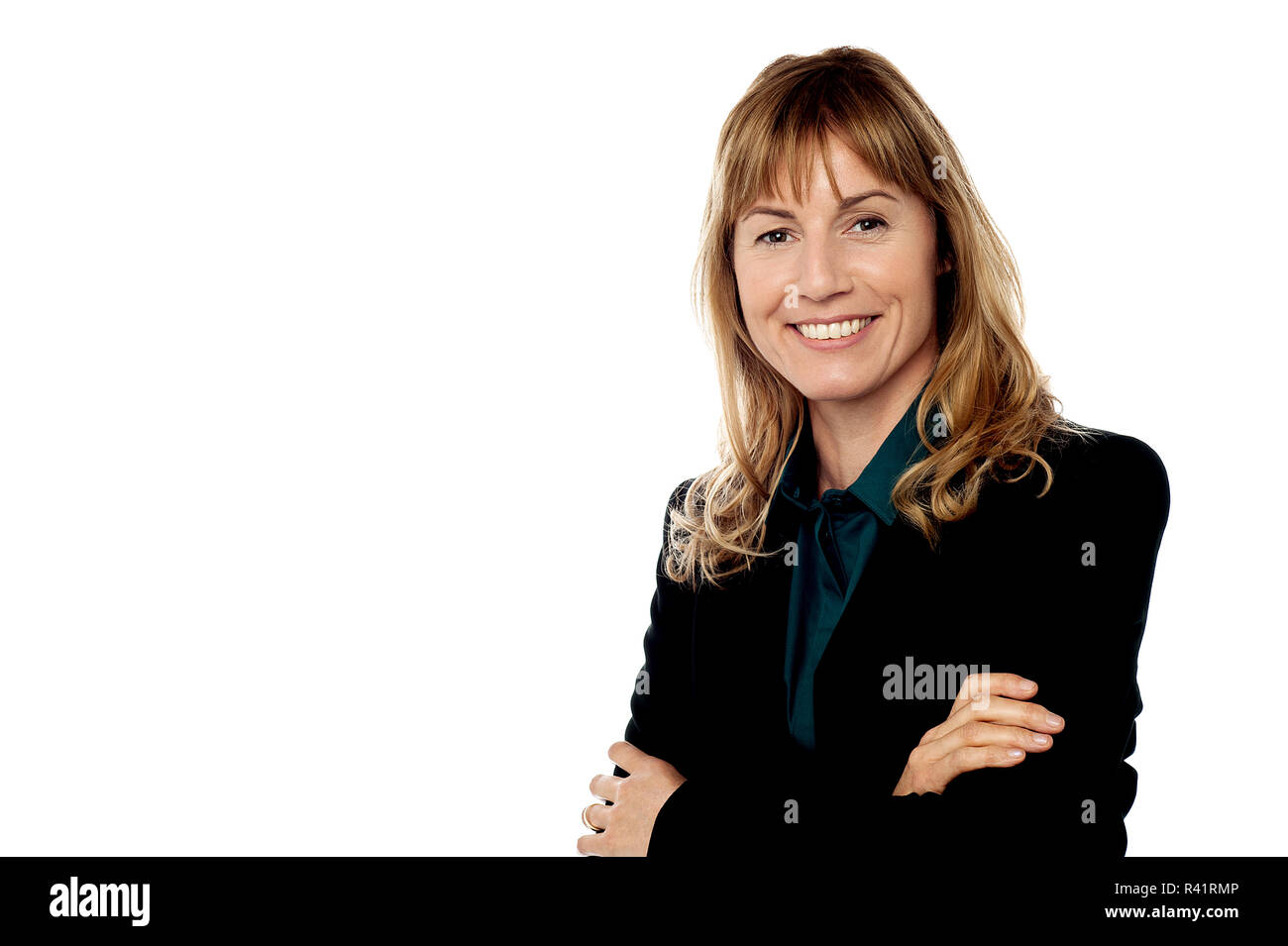 Business lady posing with folded arms Stock Photo - Alamy