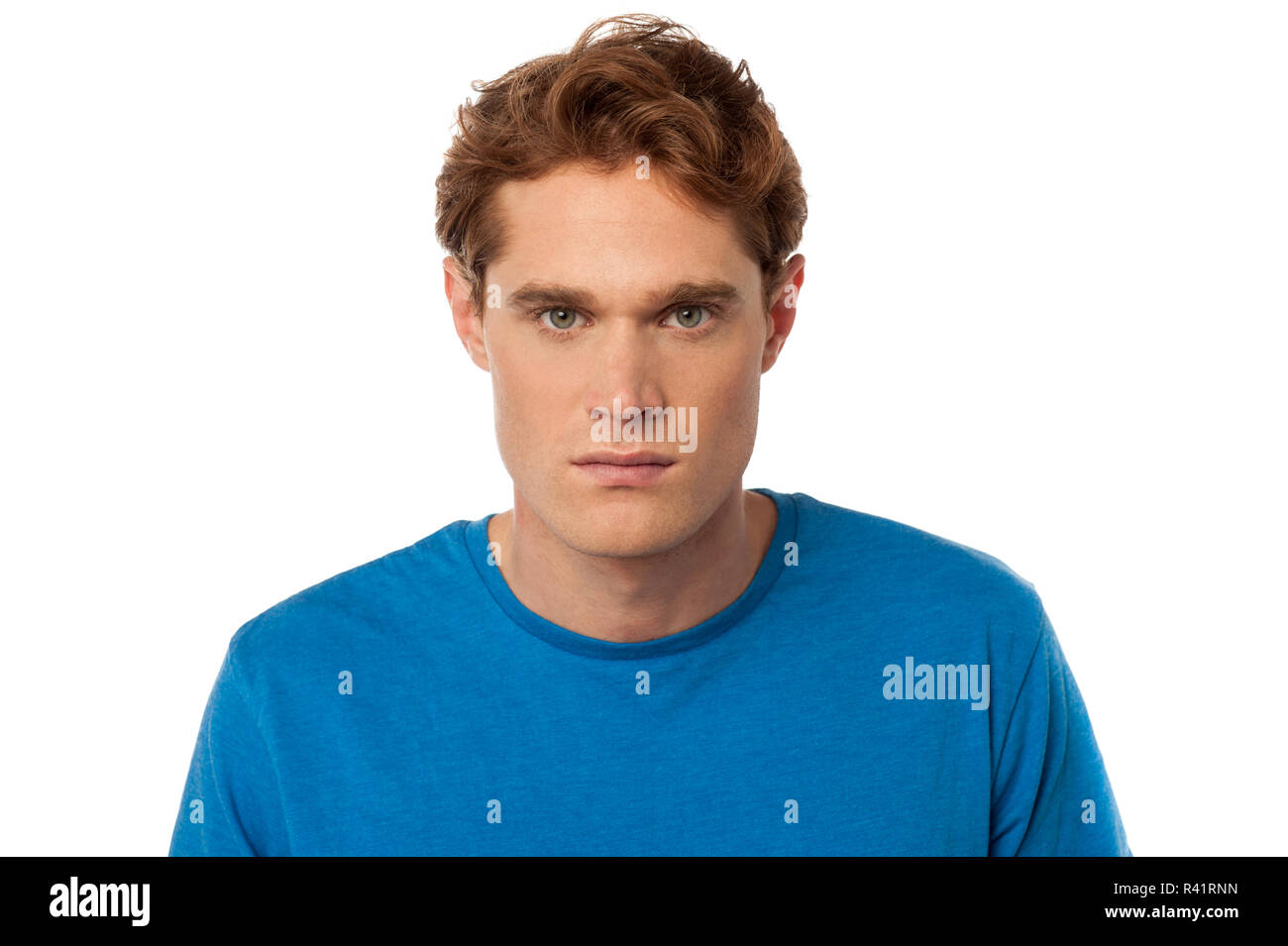 Young serious man staring Stock Photo - Alamy
