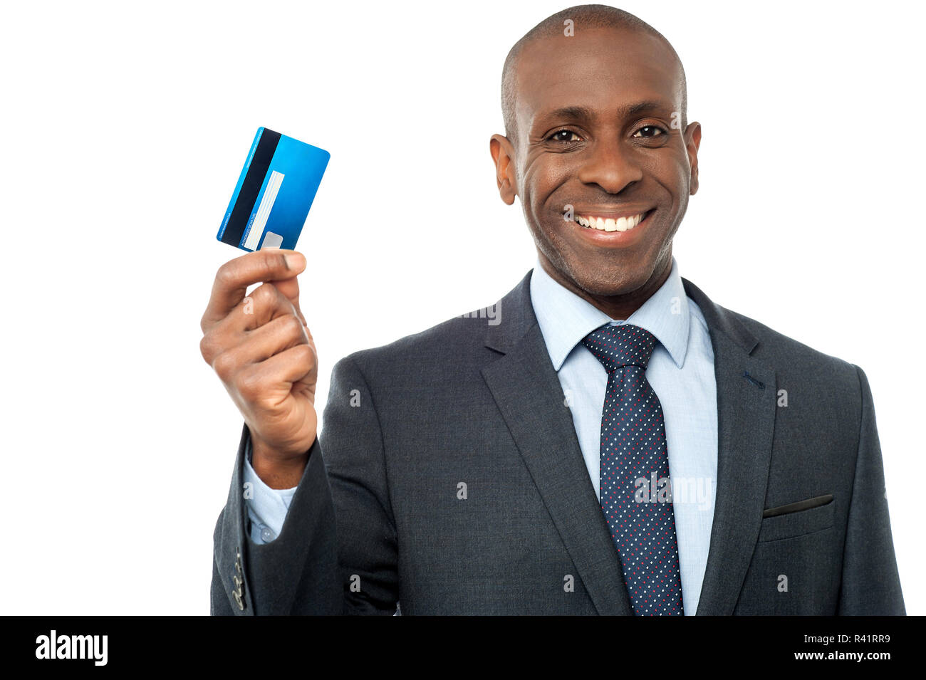 Smiling corporate guy showing credit card Stock Photo - Alamy
