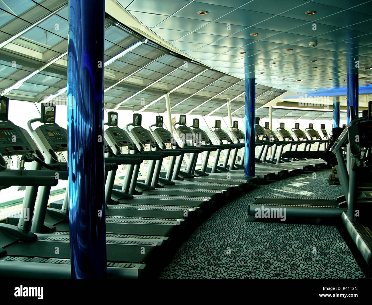 These treadmills are part of the fitness center on the Royal Caribbean ...