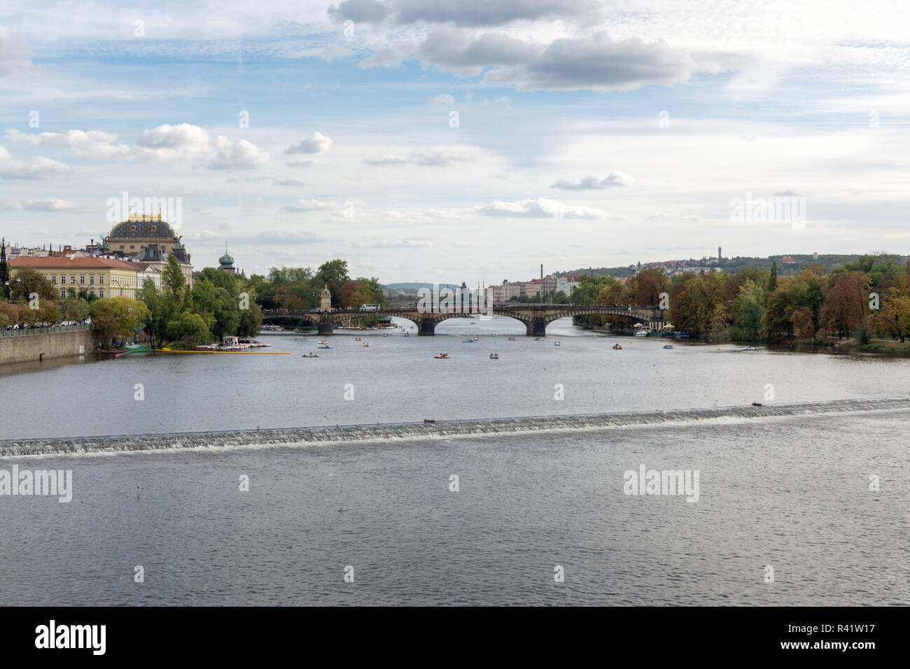 Prague waterfront panorama on a cloudy day, with Vltava river, Legion ...