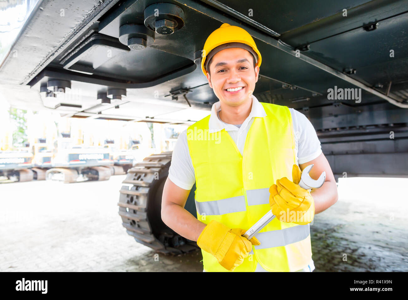 Maintenance engineer repairing robot hi-res stock photography and ...