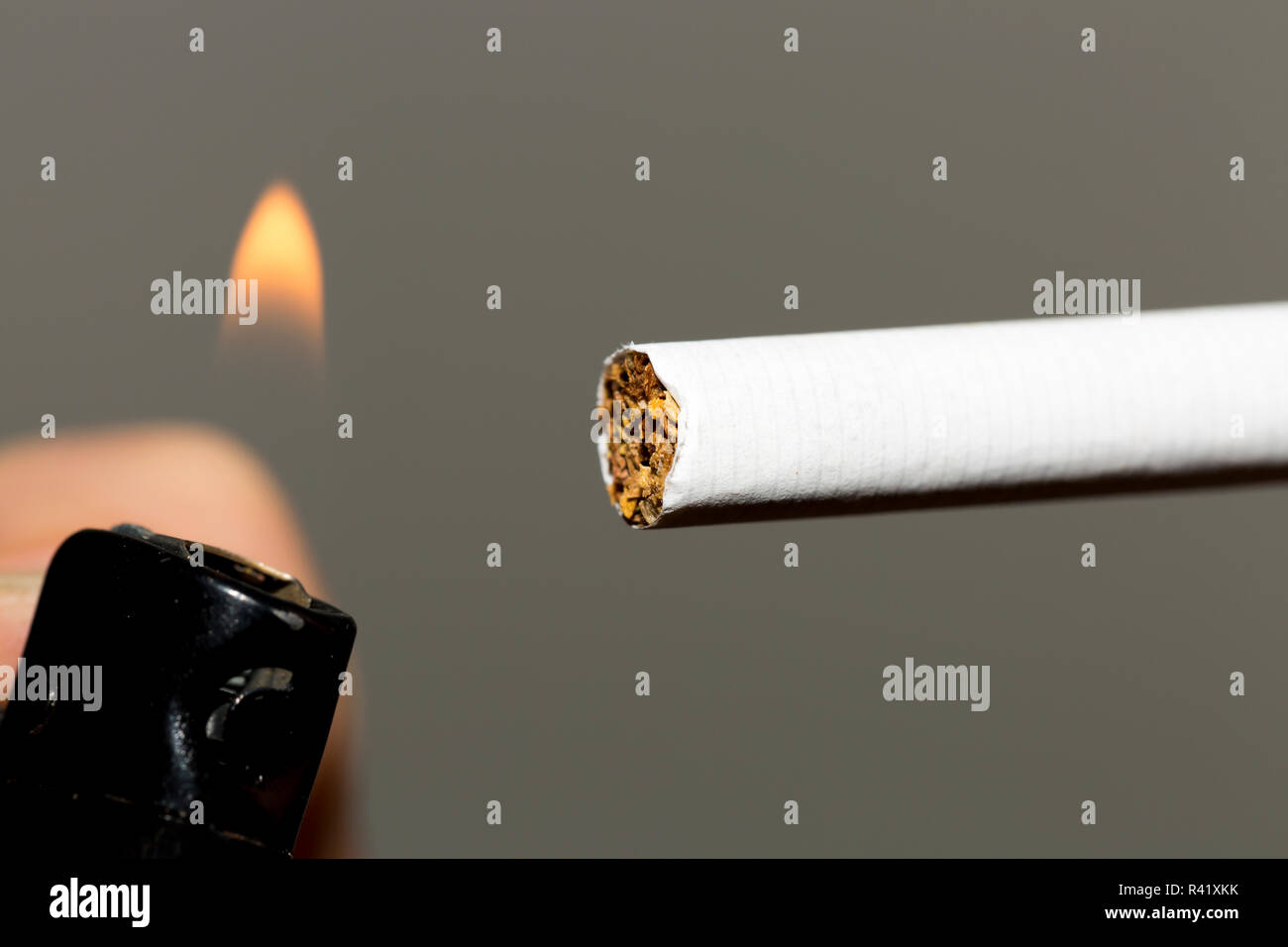 Lighting a Cigarette Stock Photo - Alamy