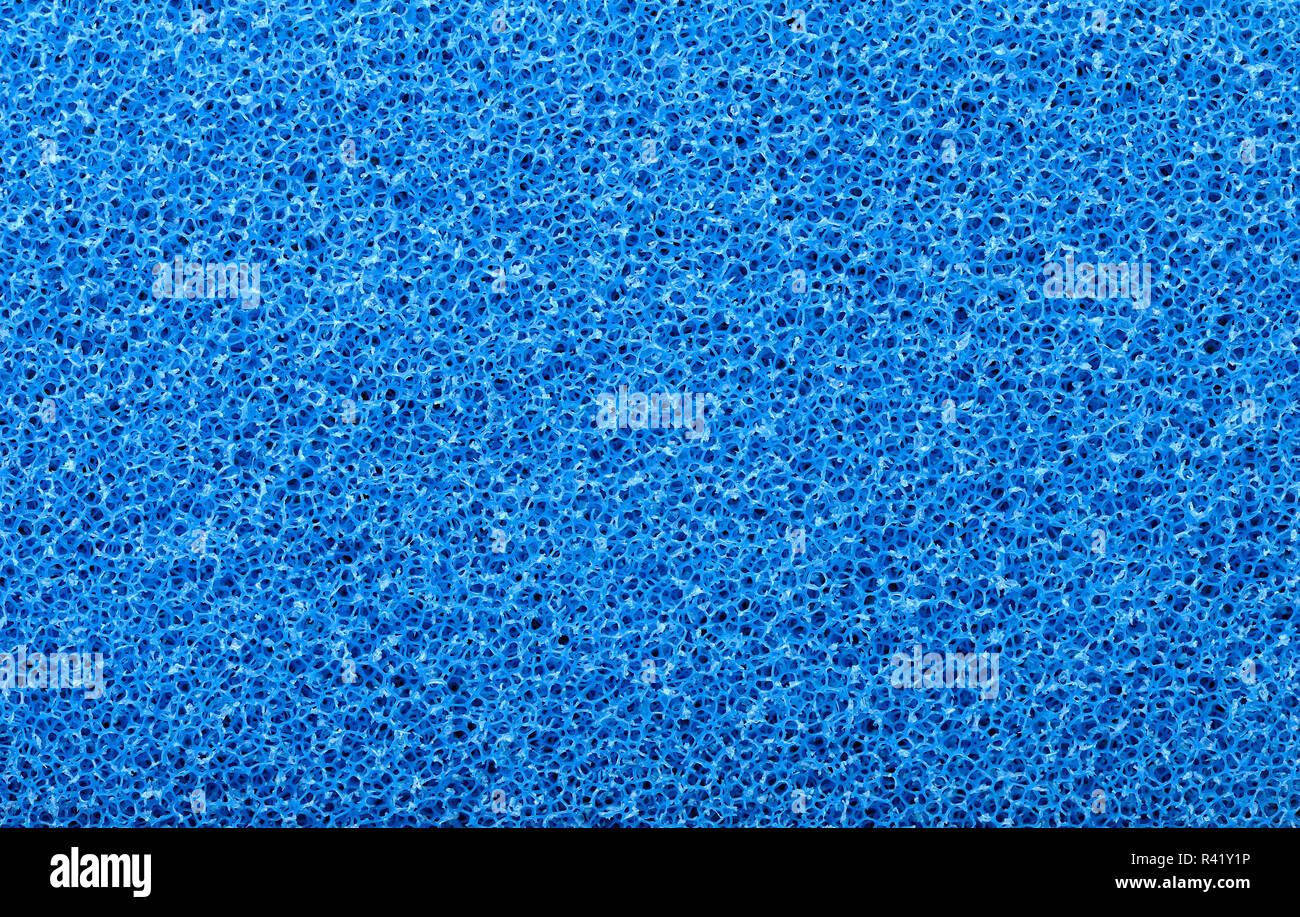 Blue sponge texture closeup background Stock Photo - Alamy