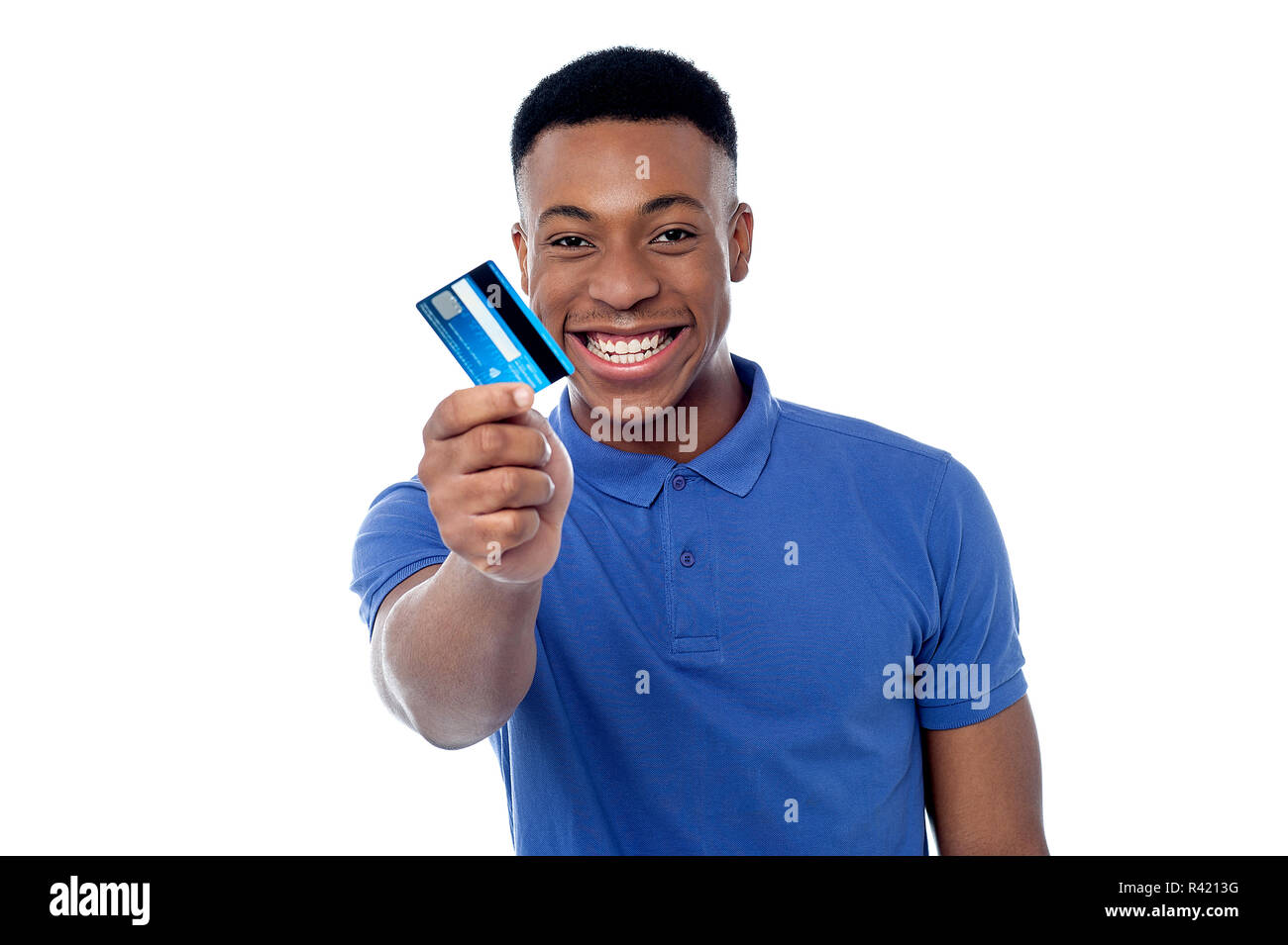 Young guy offering credit card Stock Photo - Alamy