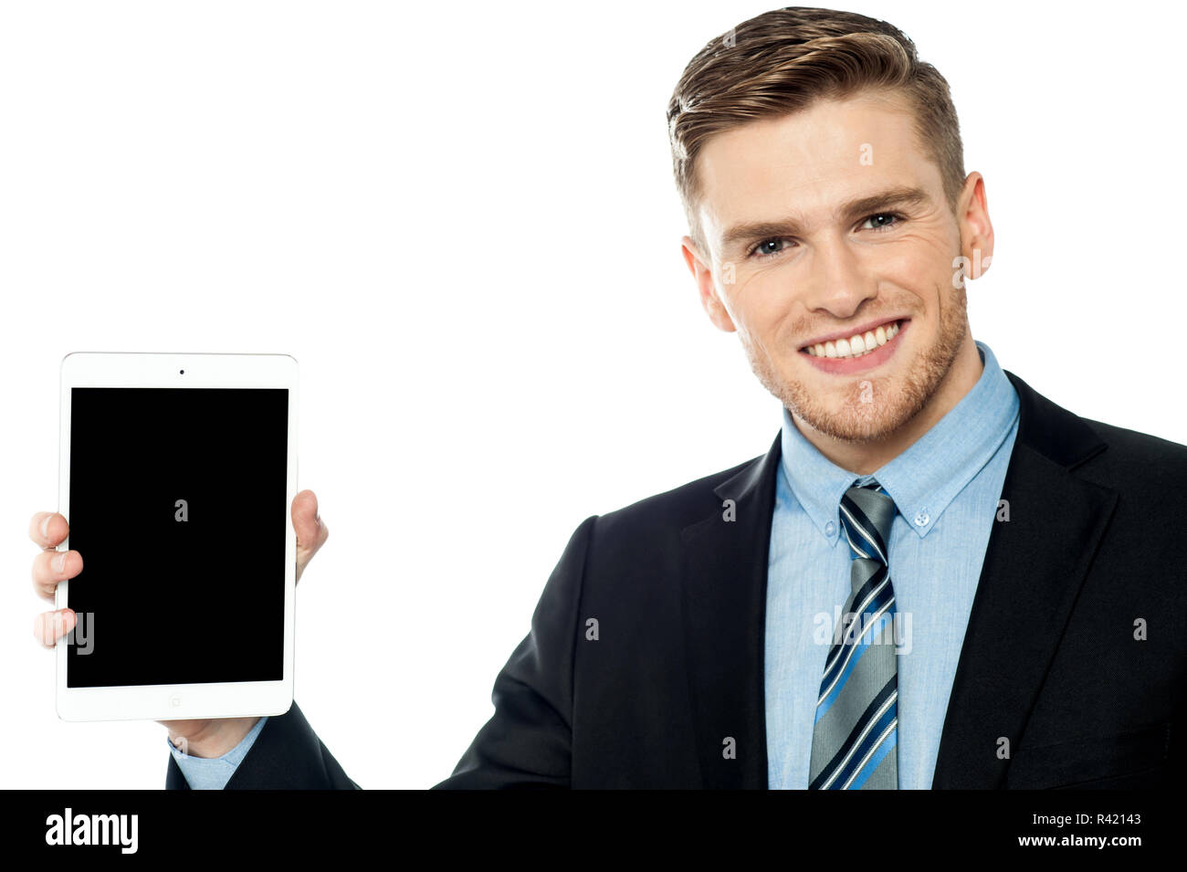 Business person showcasing tablet device Stock Photo - Alamy