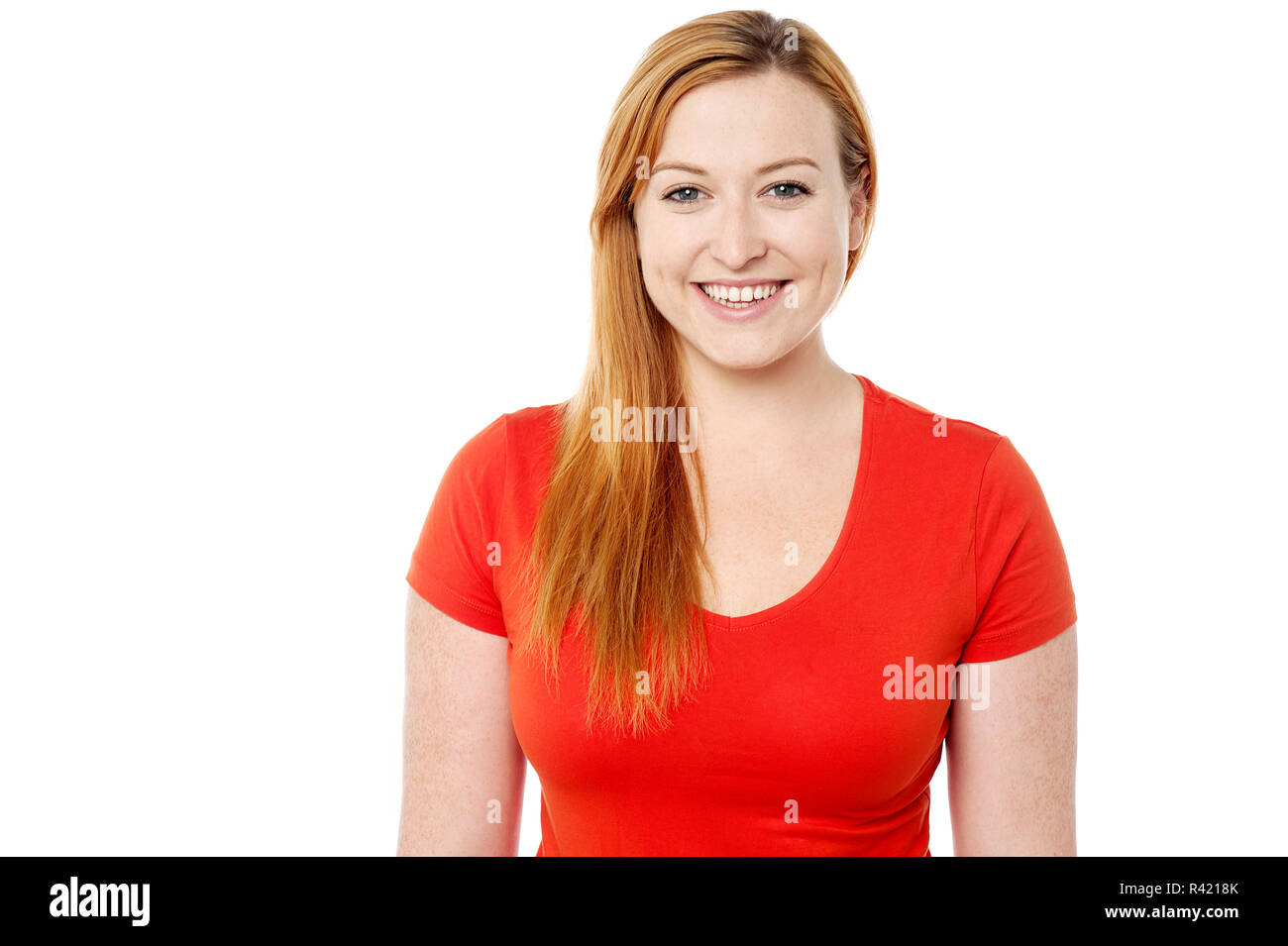 Pretty lady in vibrant red top Stock Photo - Alamy