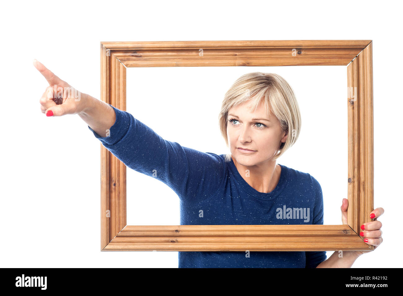Look at that thing. Woman pointing away Stock Photo - Alamy