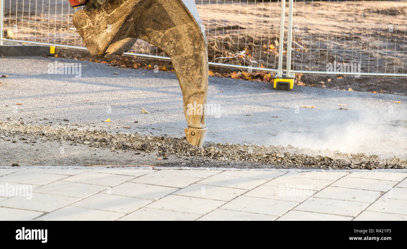 Excavator Ripping Asphalt Stock Photo - Alamy