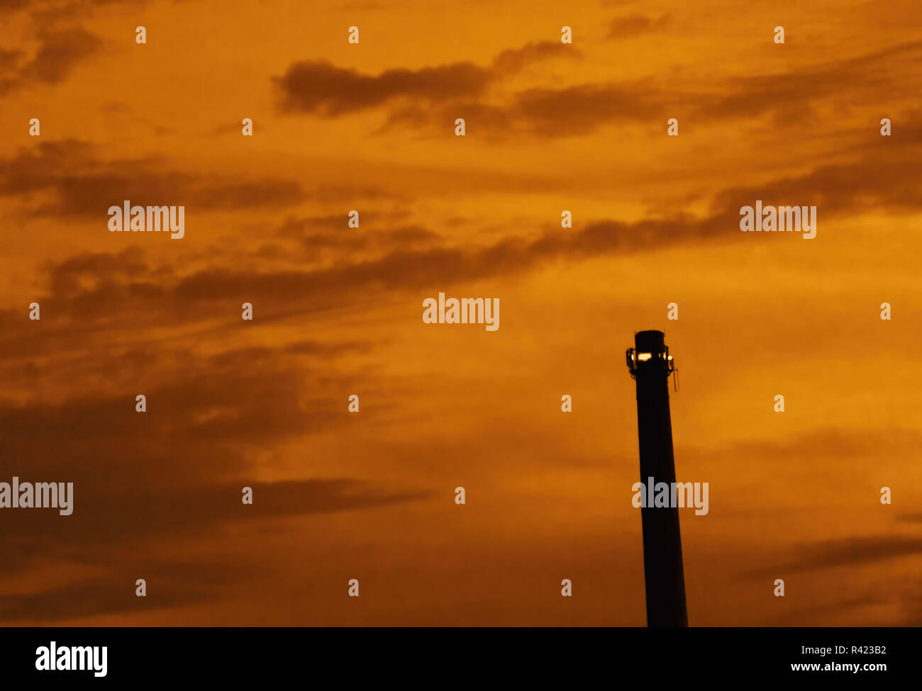 A sundown above a chimney Stock Photo - Alamy