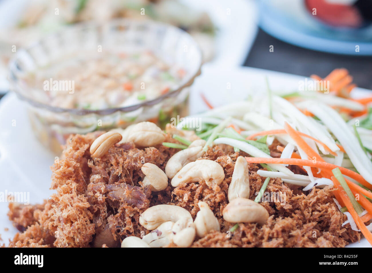 Spicy crispy tuna with green mango salad Stock Photo - Alamy