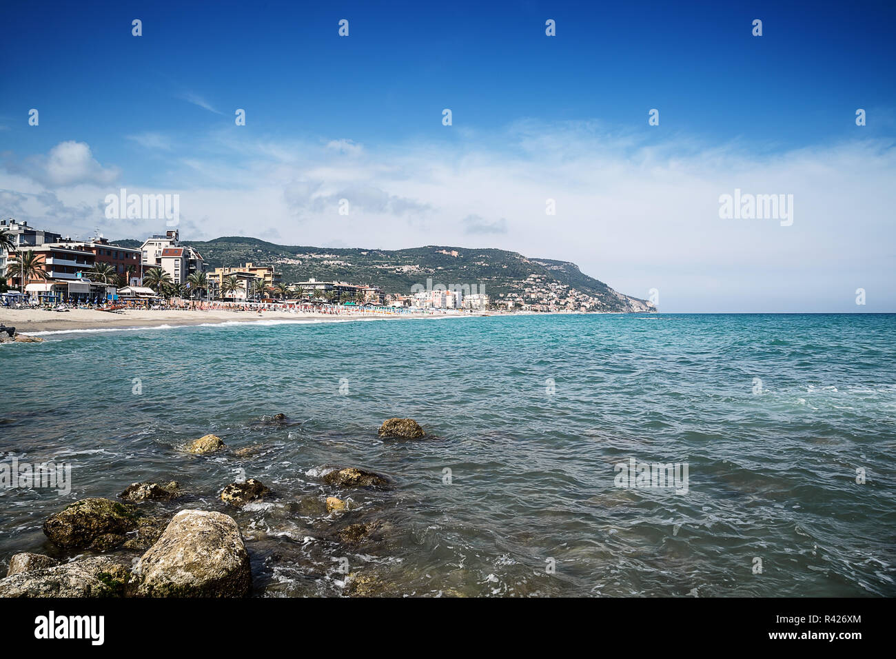 Beautiful scenic view on coast and blue sea texture in foreground ...